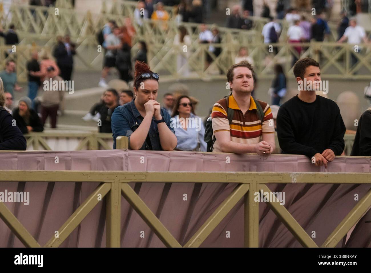 VATICAN POPE VOTE CONCLAVE people in st. peter s square watch the ...