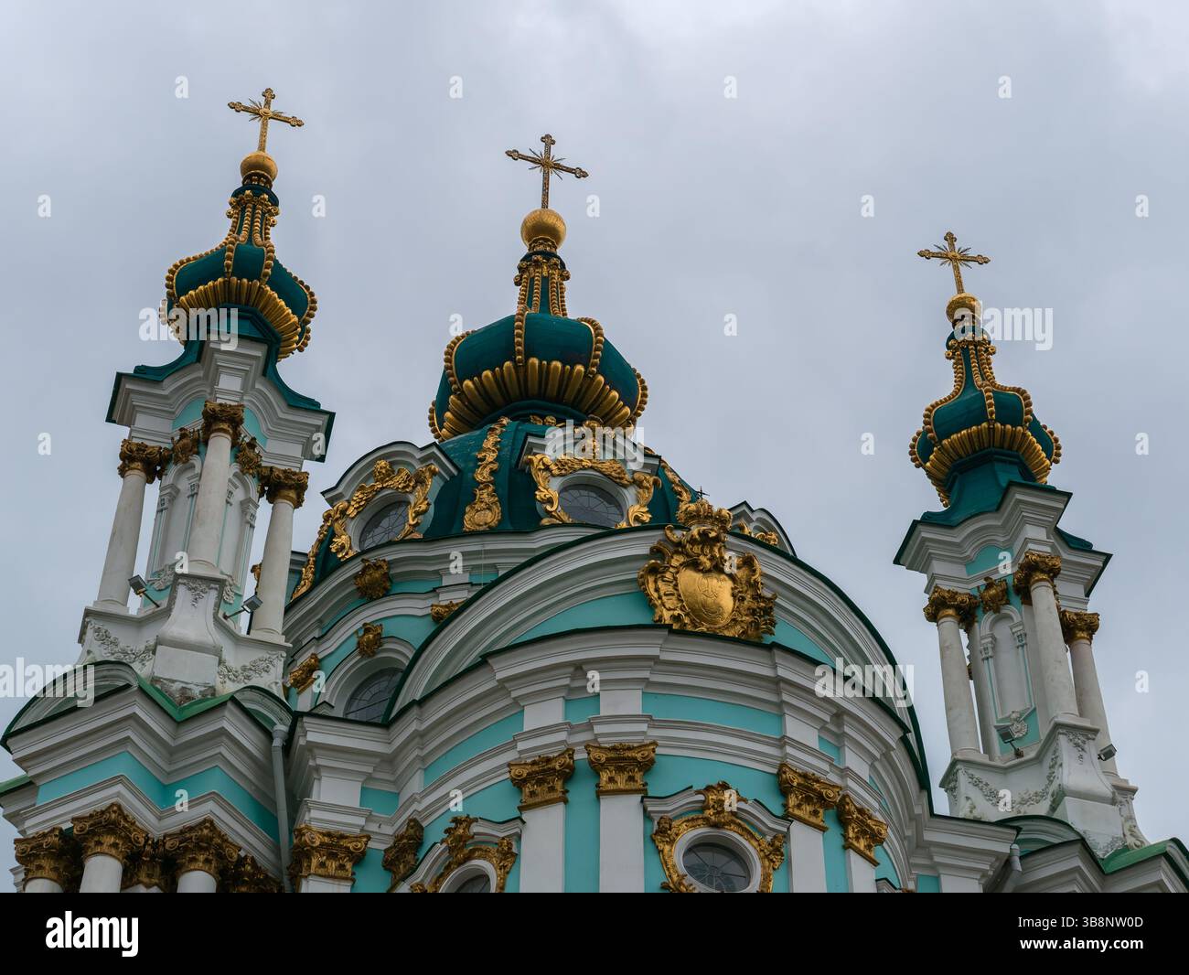 The gilded domes and ornate crosses of St. Andrew's Church in Kyiv ...