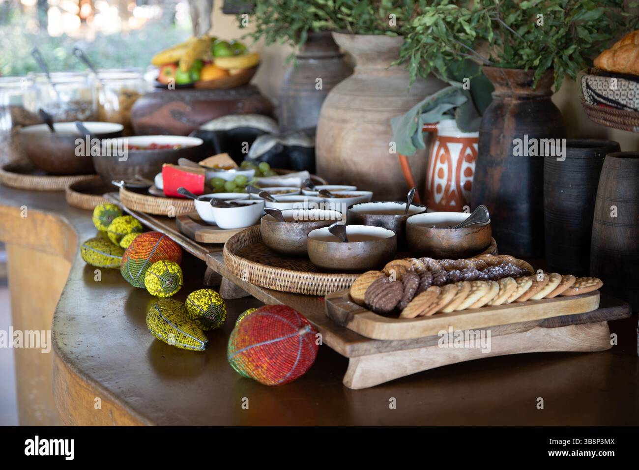 Lodge breakfast buffet with hand carved bowls Stock Photo - Alamy
