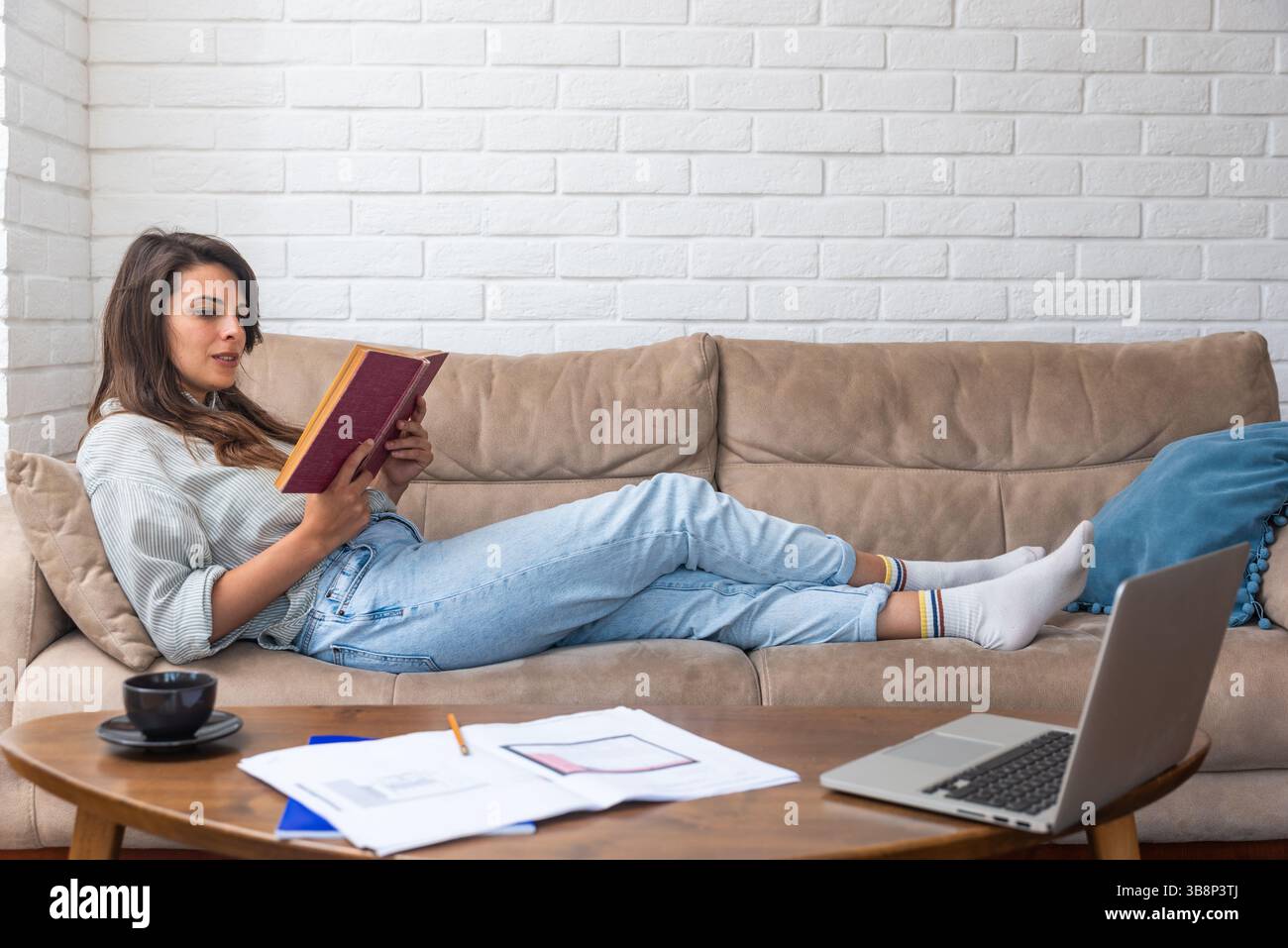 Young intelligent innovative architect businesswoman having issue with concentration and ...