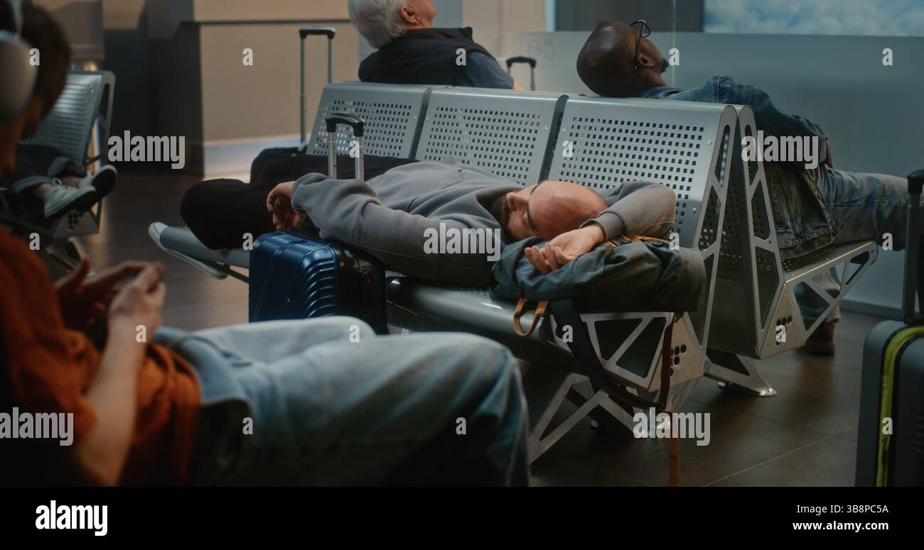 Crowded International Airport Terminal: Exhausted Man with Luggage ...