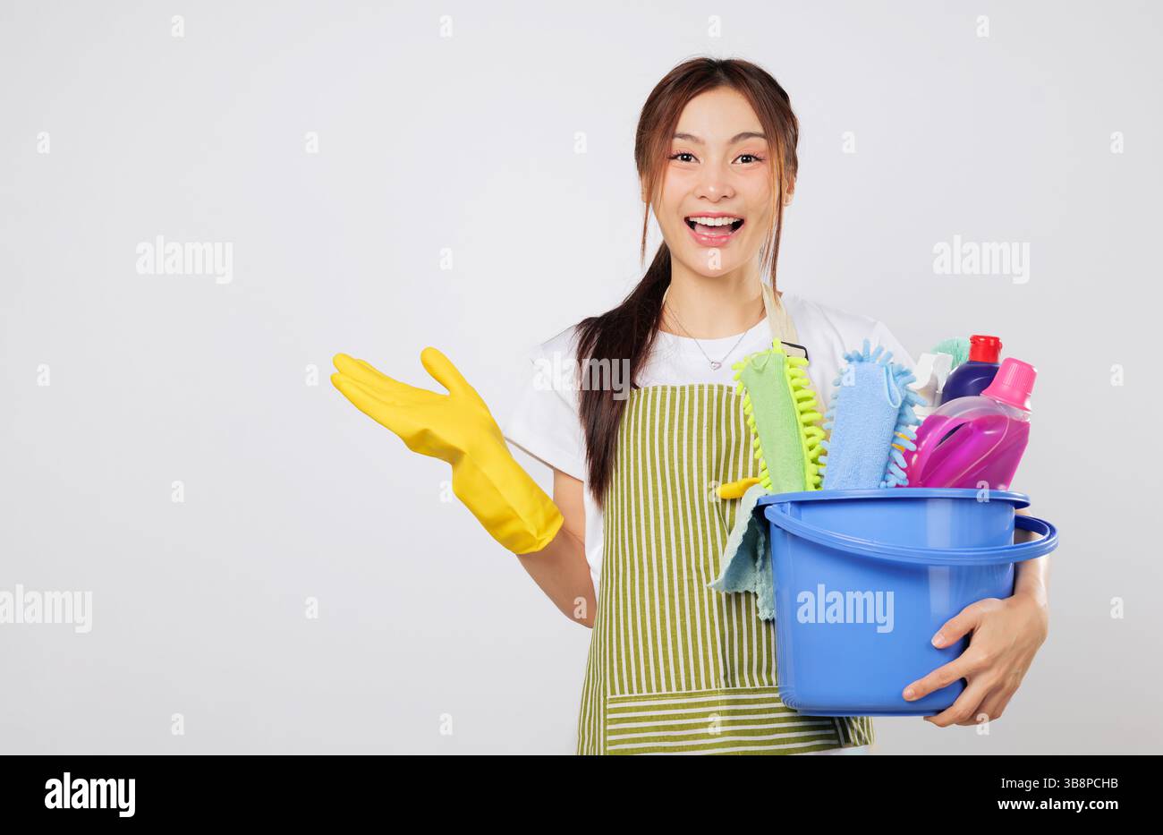 Cleaning items visible while woman demonstrates with her palm Stock ...