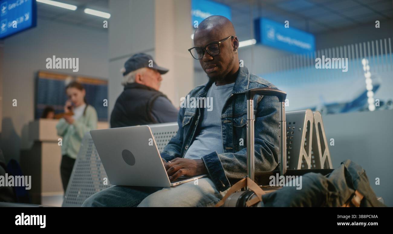 Crowded International Airport Terminal: African American Man Using ...