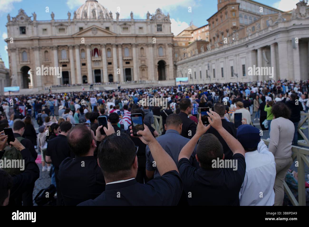 Faithful take photos the black smoke billows from the Sistine Chapel ...
