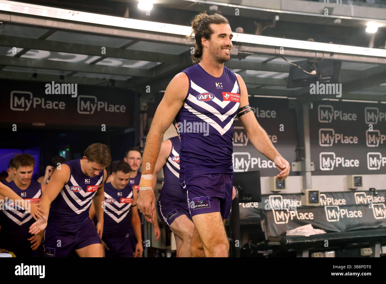 Alex Pearce of the Dockers enters the field before the start of play ...