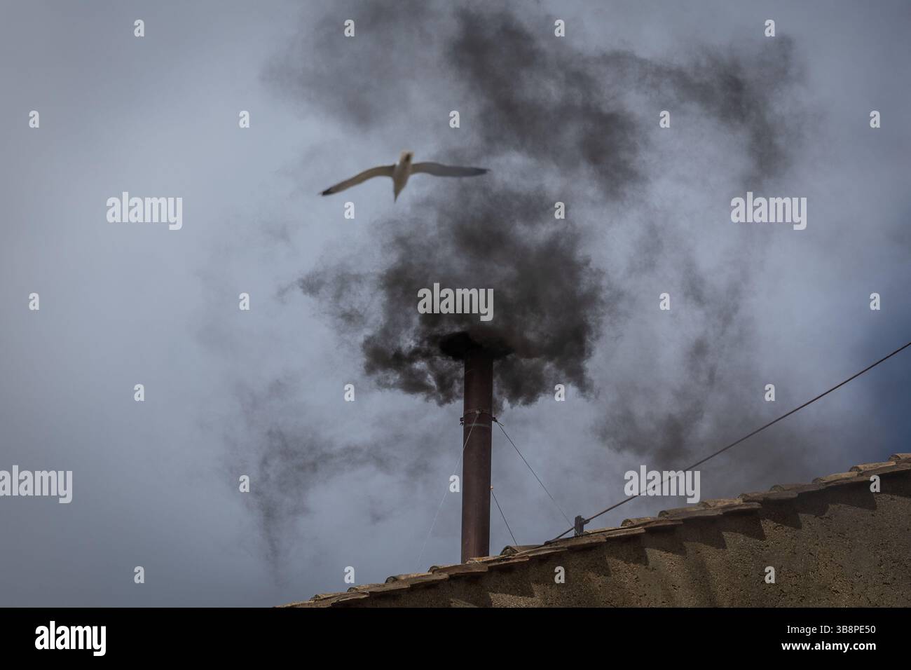 Vatikanstadt, Vatican. 08th May, 2025. Black smoke comes out of the ...