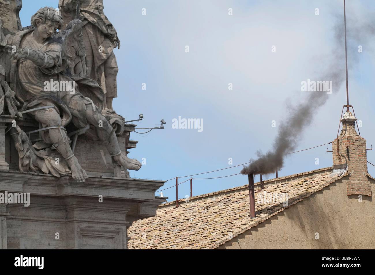 Black smoke billows from the chimney of the Sistine Chapel during the ...