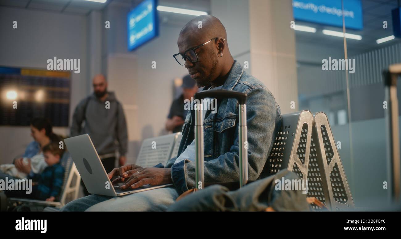 Crowded International Airport Terminal: African American Man Using ...