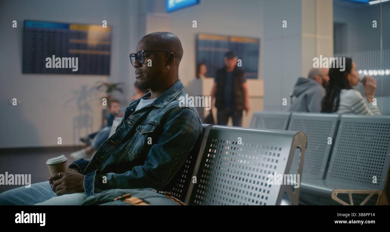 Crowded International Airport Terminal: African American Young Man ...