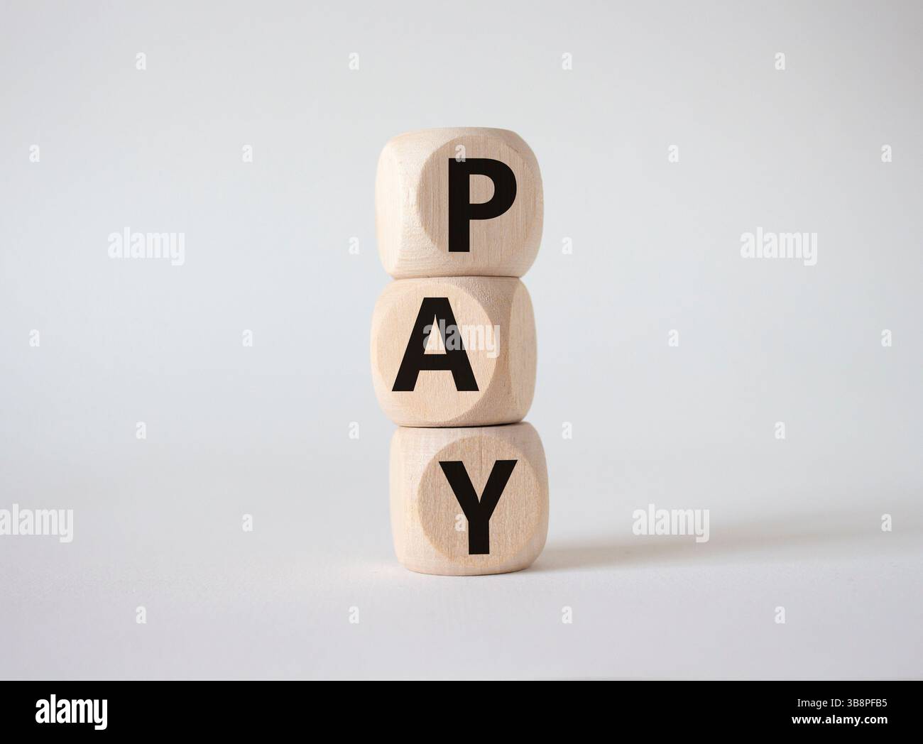 Payment symbol. Wooden cubes with words Pay. Beautiful white background ...