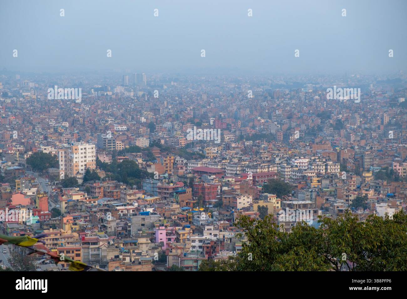 Kathmandu, Nepal, is seen from above. Air pollution obscures the view ...