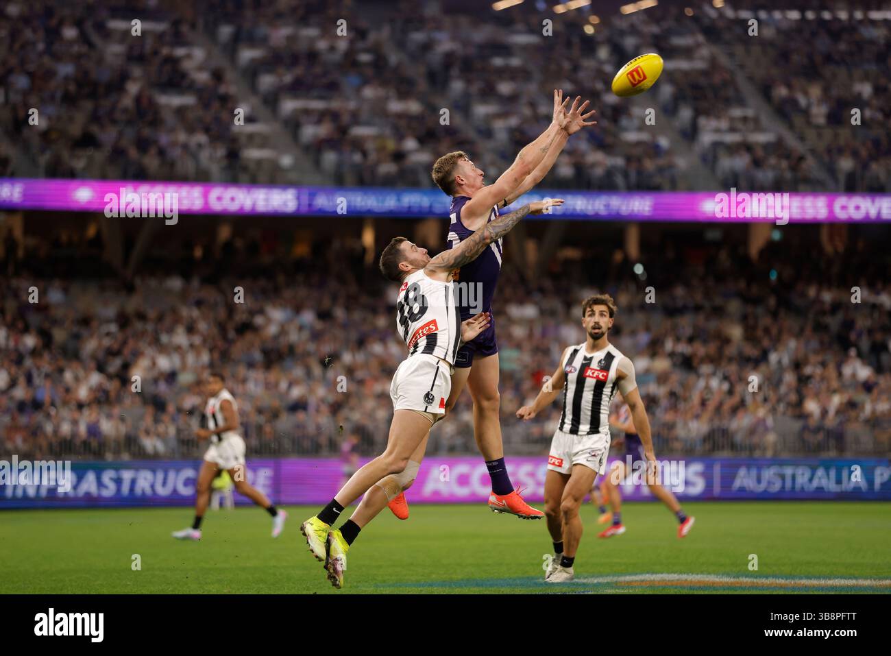 Perth, Australia. 08th May, 2025. Josh Treacy of the Dockers marks the ...