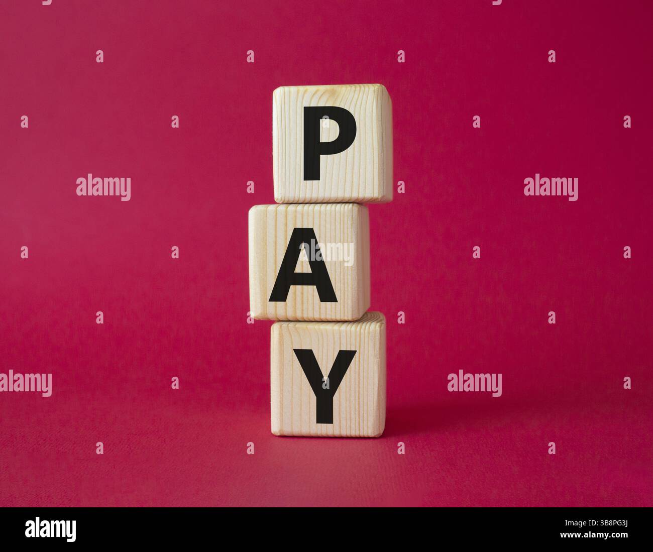 Payment symbol. Wooden cubes with words Pay. Beautiful red background ...
