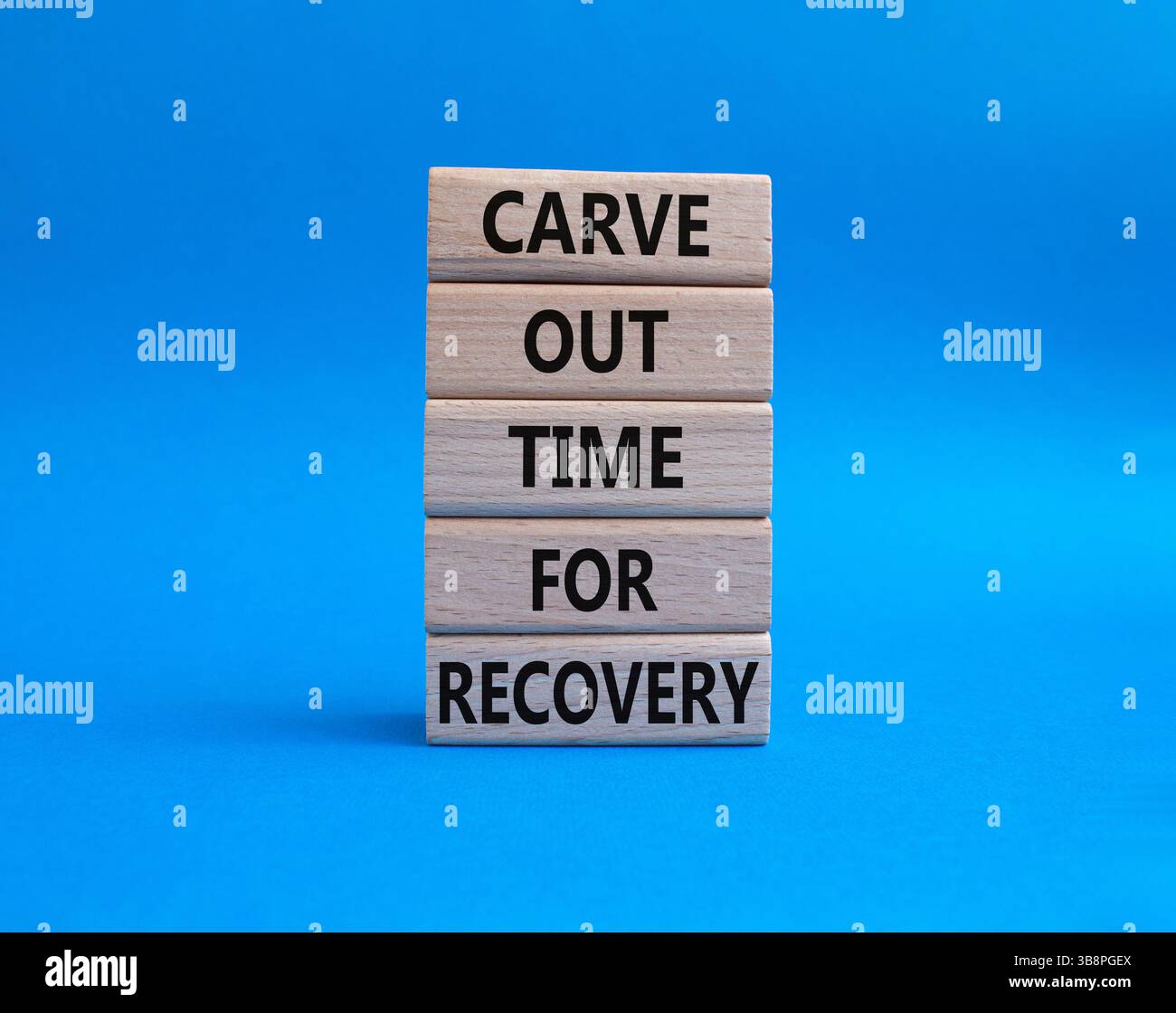Carve out time for recovery symbol. Wooden blocks with words Carve out ...