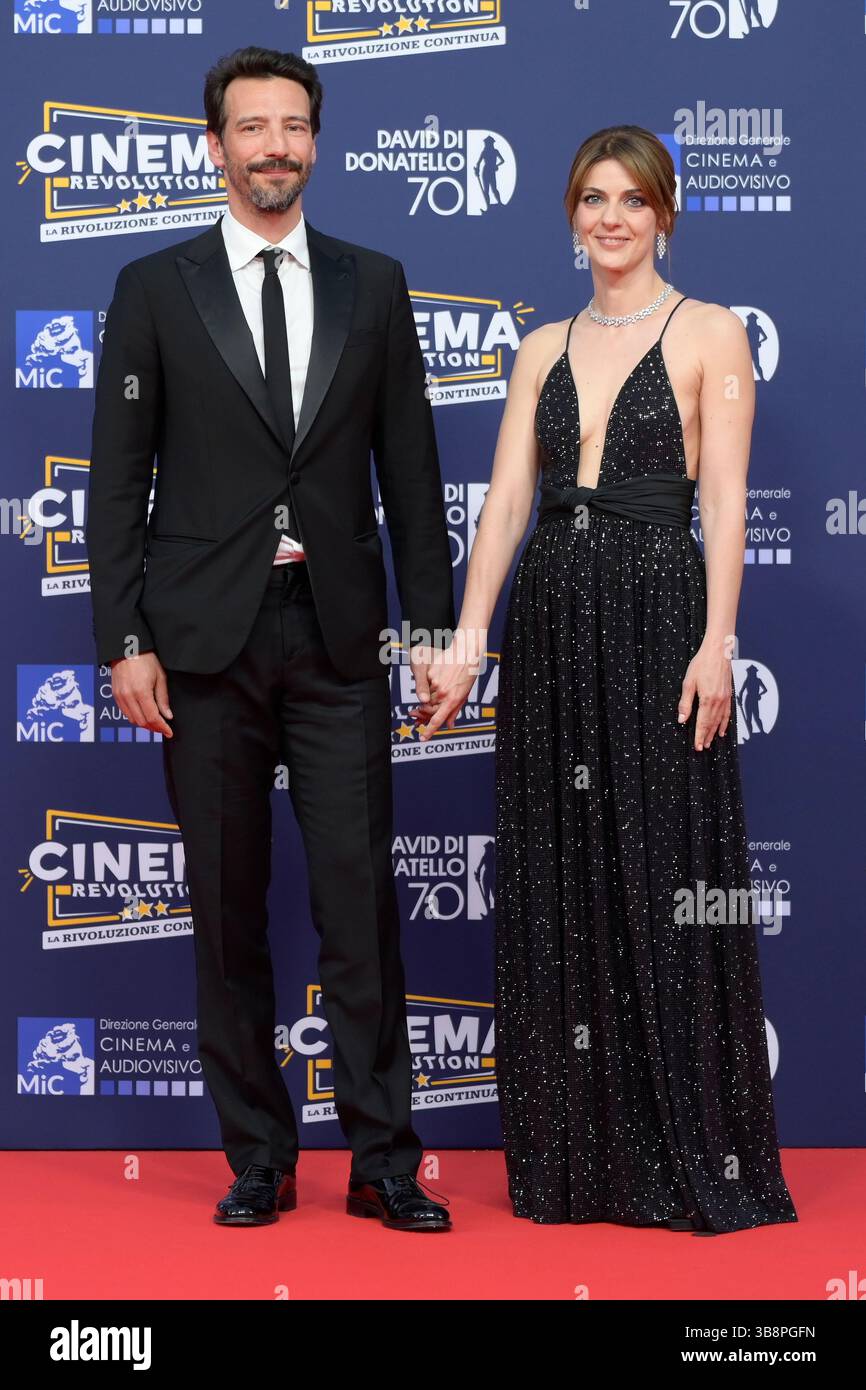 Alessandro Tedeschi (l) and Barbara Ronchi (r) attend the red carpet of David di Donatello 2025 ...