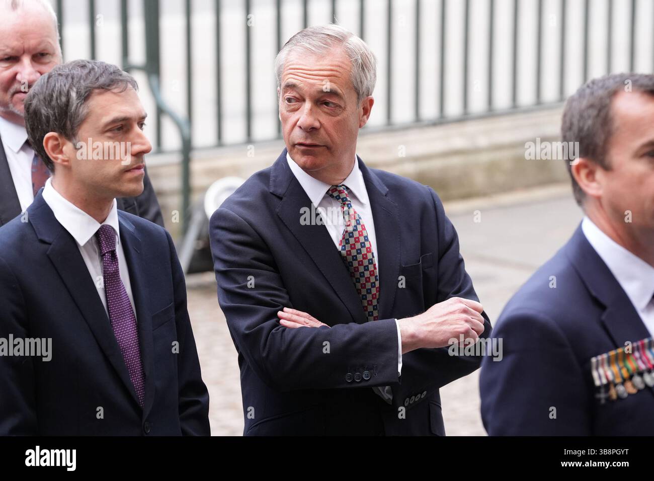 Reform UK leader Nigel Farage (centre) arrives to attend a Service of ...