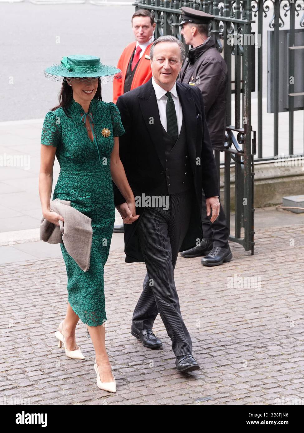 Former prime minister David Cameron and wife Samantha arrive to attend ...