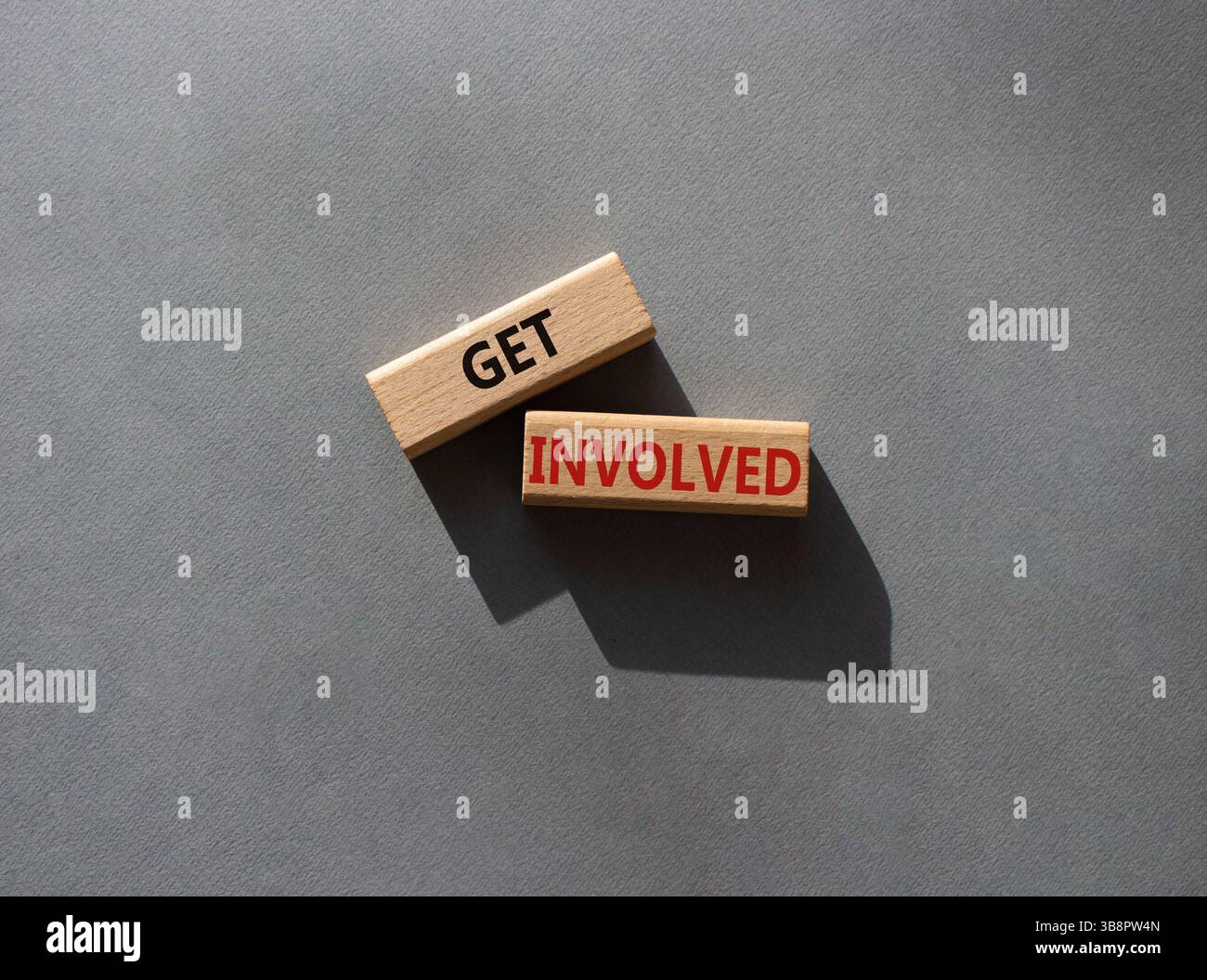 Get involved symbol. Wooden blocks with words Get involved. Beautiful ...