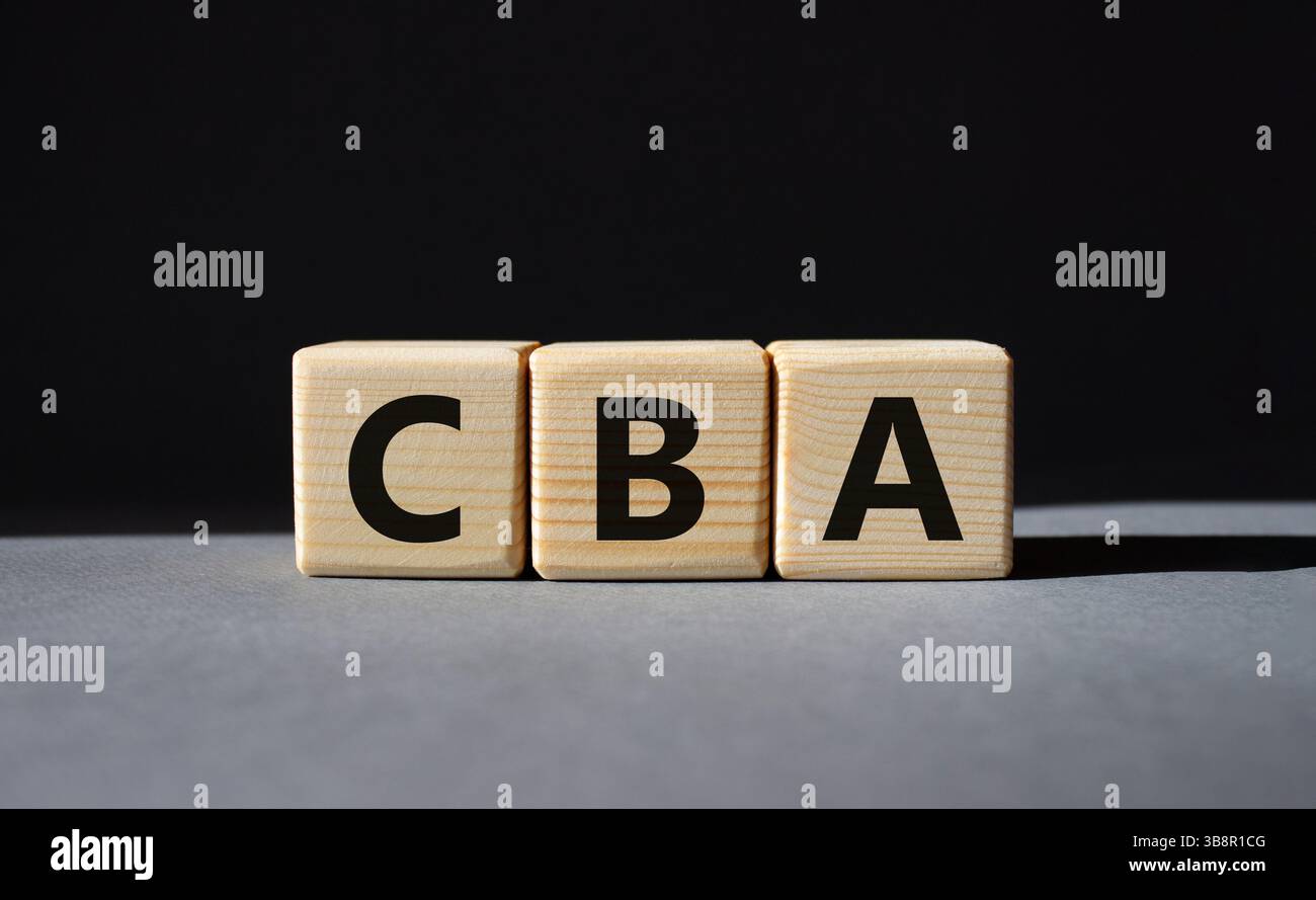 CBA - Cost Benefit Analysis symbol. Wooden cubes with word CBA ...
