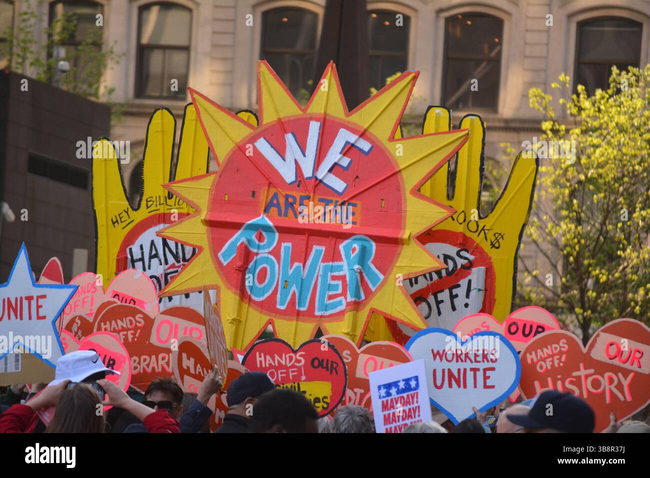 People carrying signs at a May Day march in Lower Manhattan Stock Photo ...