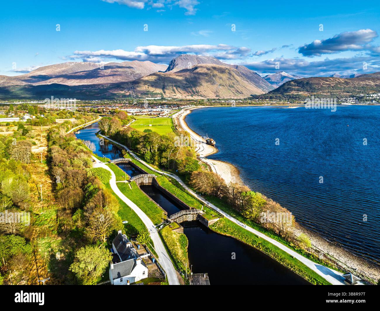 View of Caledonian Canal, Caol Beach and Nevis Range Mountains from a ...