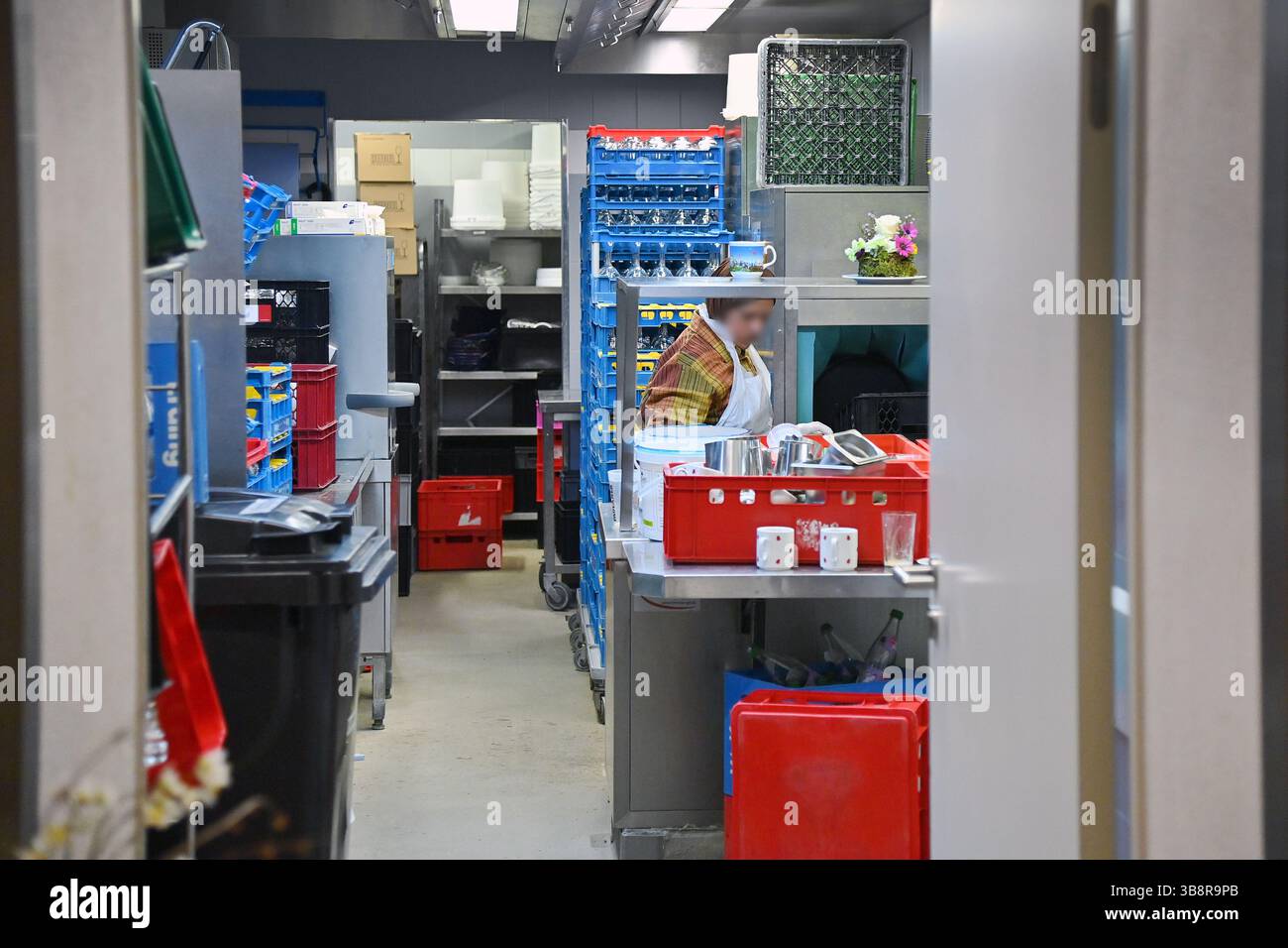 Foreign female kitchen assistants in a restaurant kitchen. Working as ...