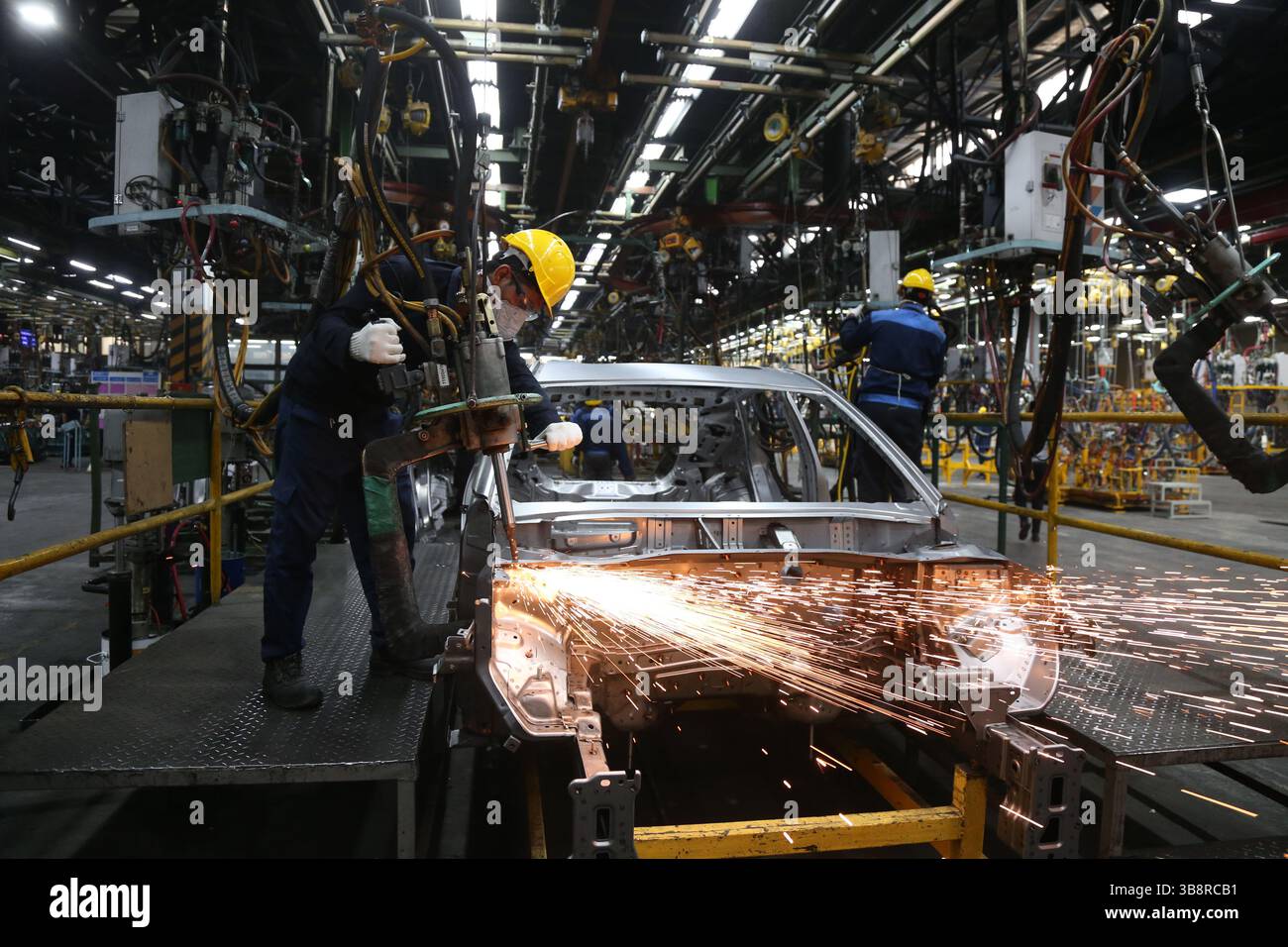 Bam, Iran. 3rd May, 2025. Workers work at an assembling workshop of ...