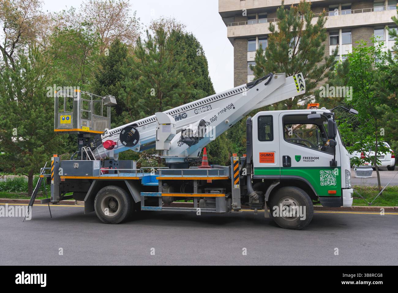 Almaty, Kazakhstan - April 29, 2025: Construction vehicle with ...