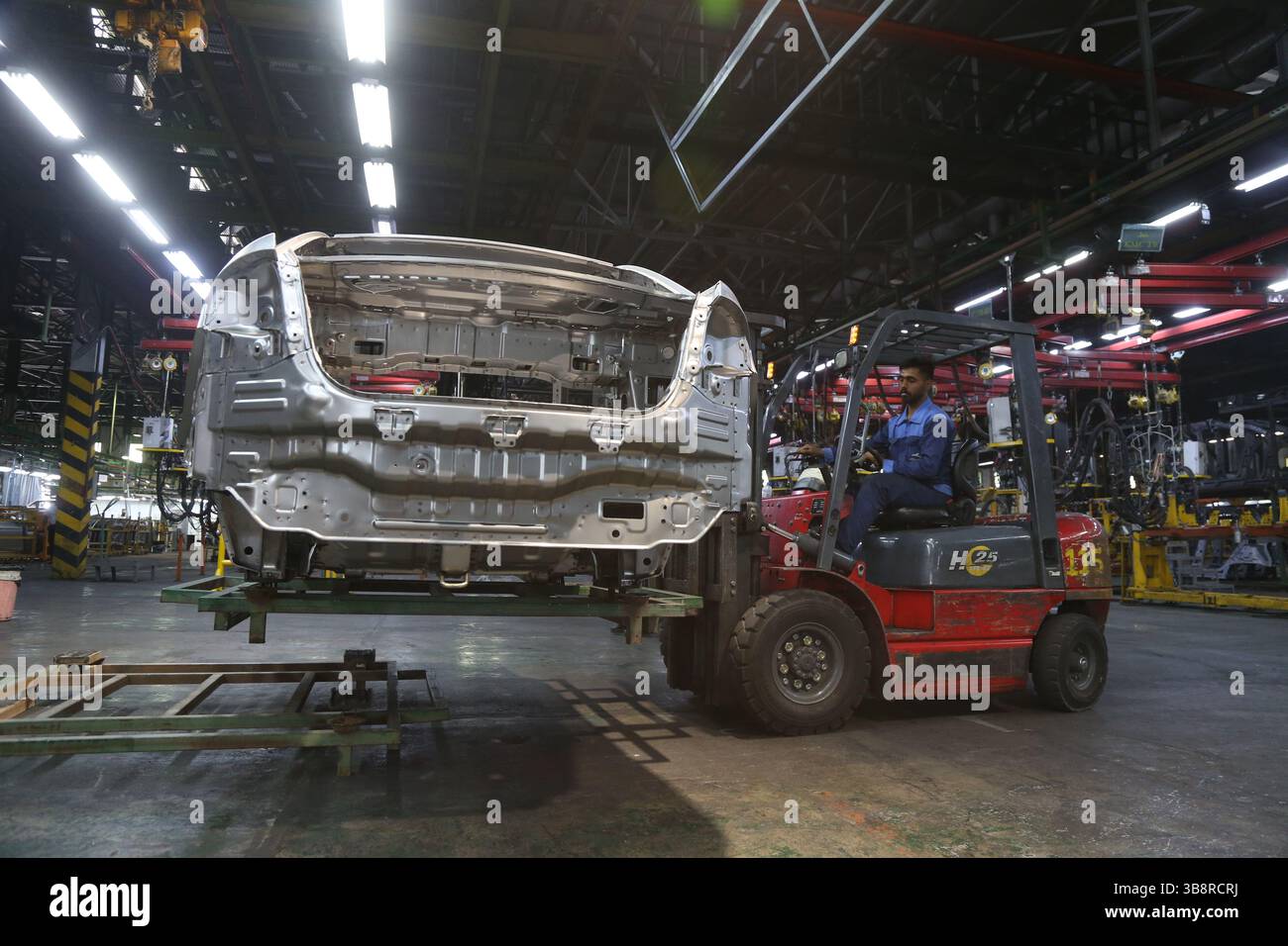 Bam, Iran. 3rd May, 2025. A worker works at an assembling workshop of ...