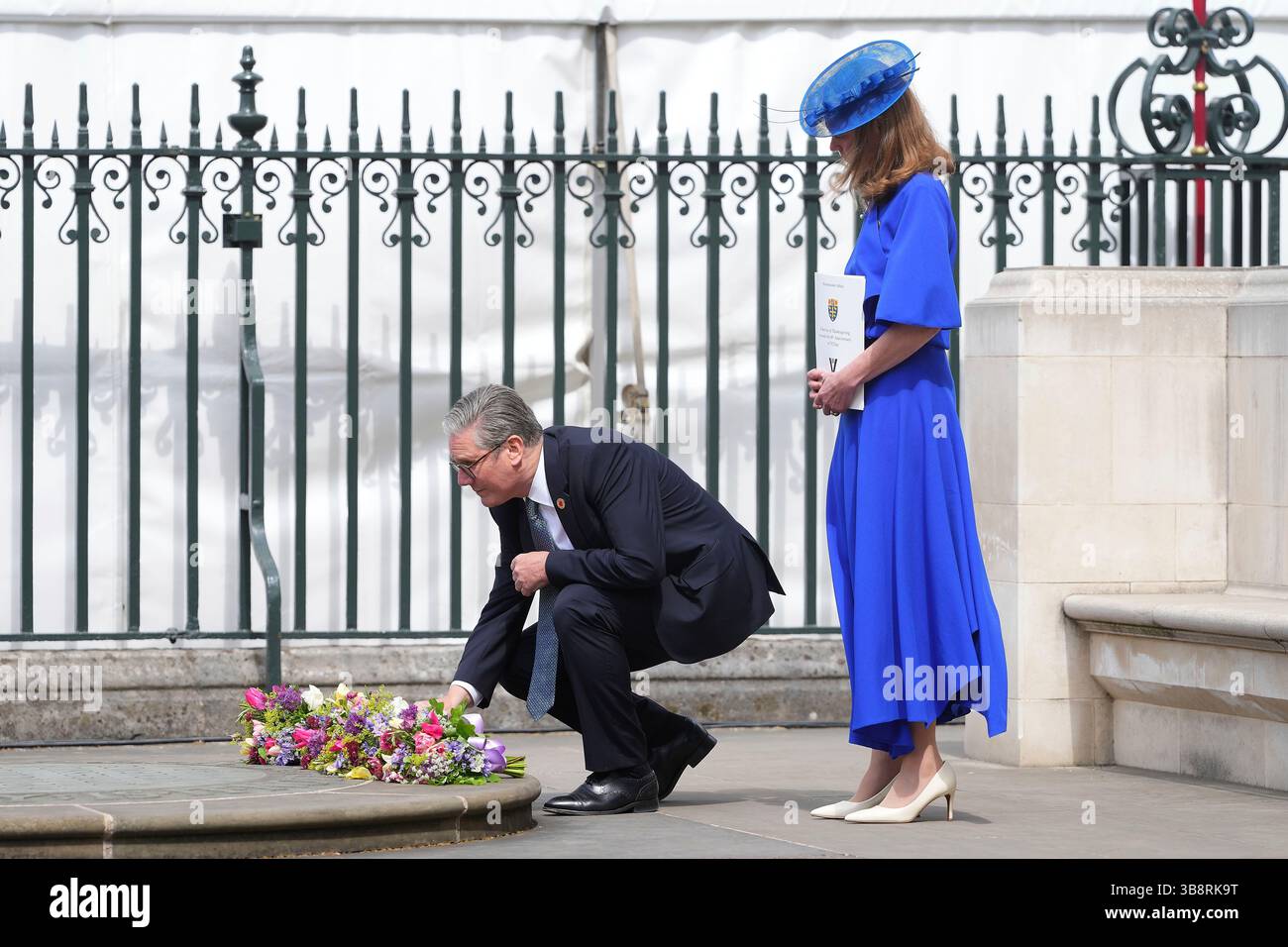 Britain's Prime Minister Keir Starmer and wife Victoria lay down ...
