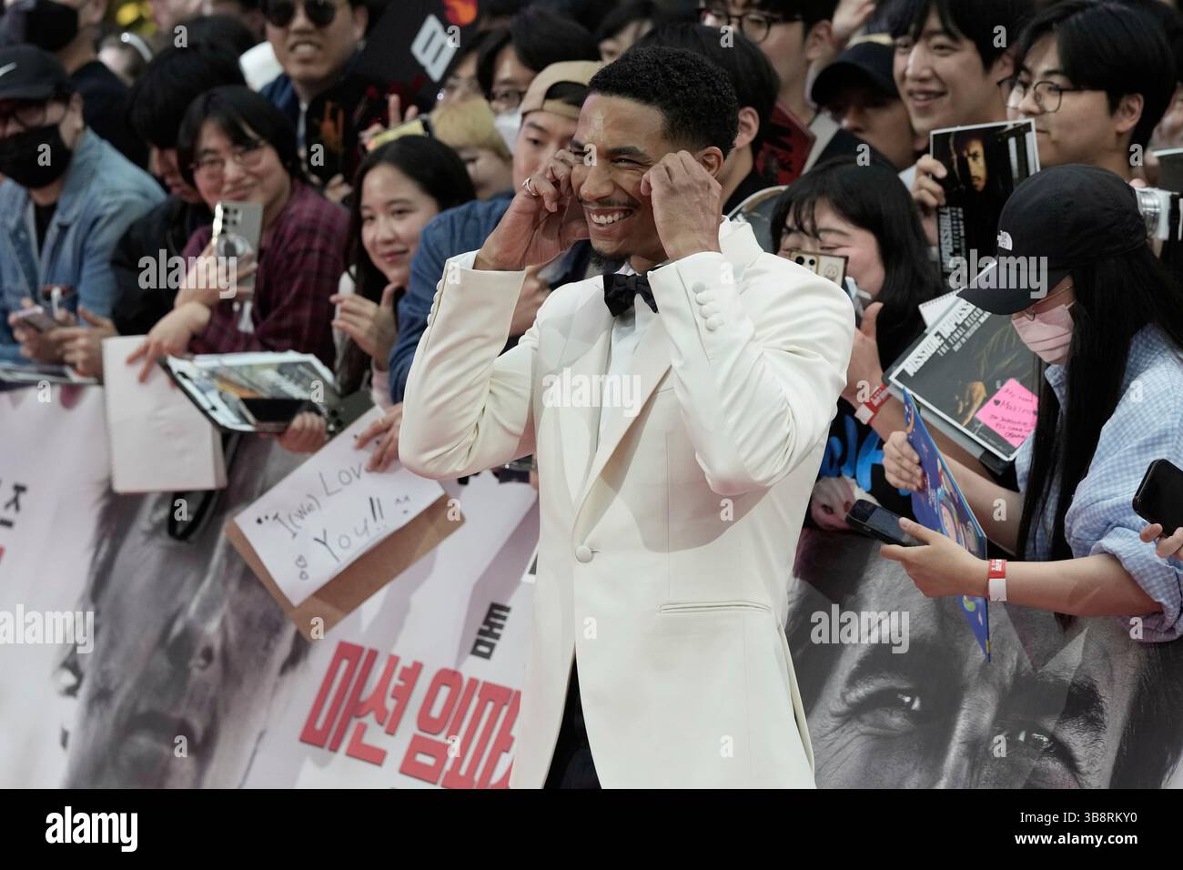 Greg Tarzan Davis poses during a red carpet event to promote his movie ...