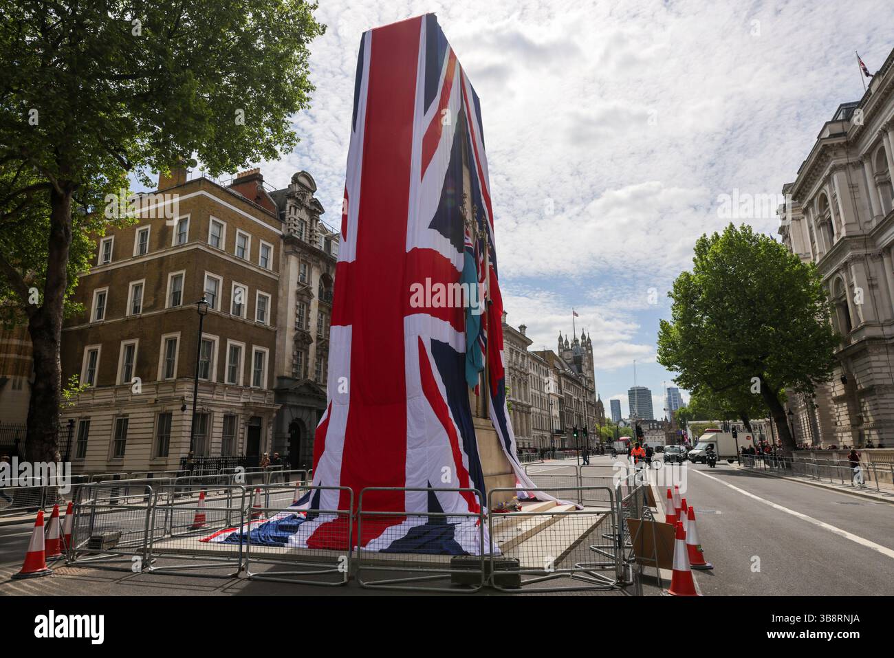 London, UK. 07th May, 2025. The Cenotaph in Whitehall is draped in a ...