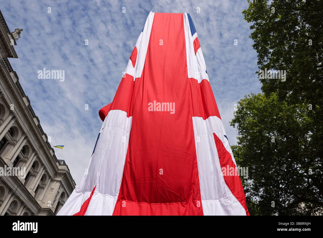 London, UK. 07th May, 2025. The Cenotaph in Whitehall is draped in a ...