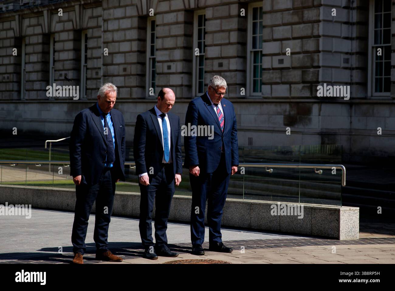(left to right) Ian Paisley Jr., Communities Minister Gordon Lyons and ...