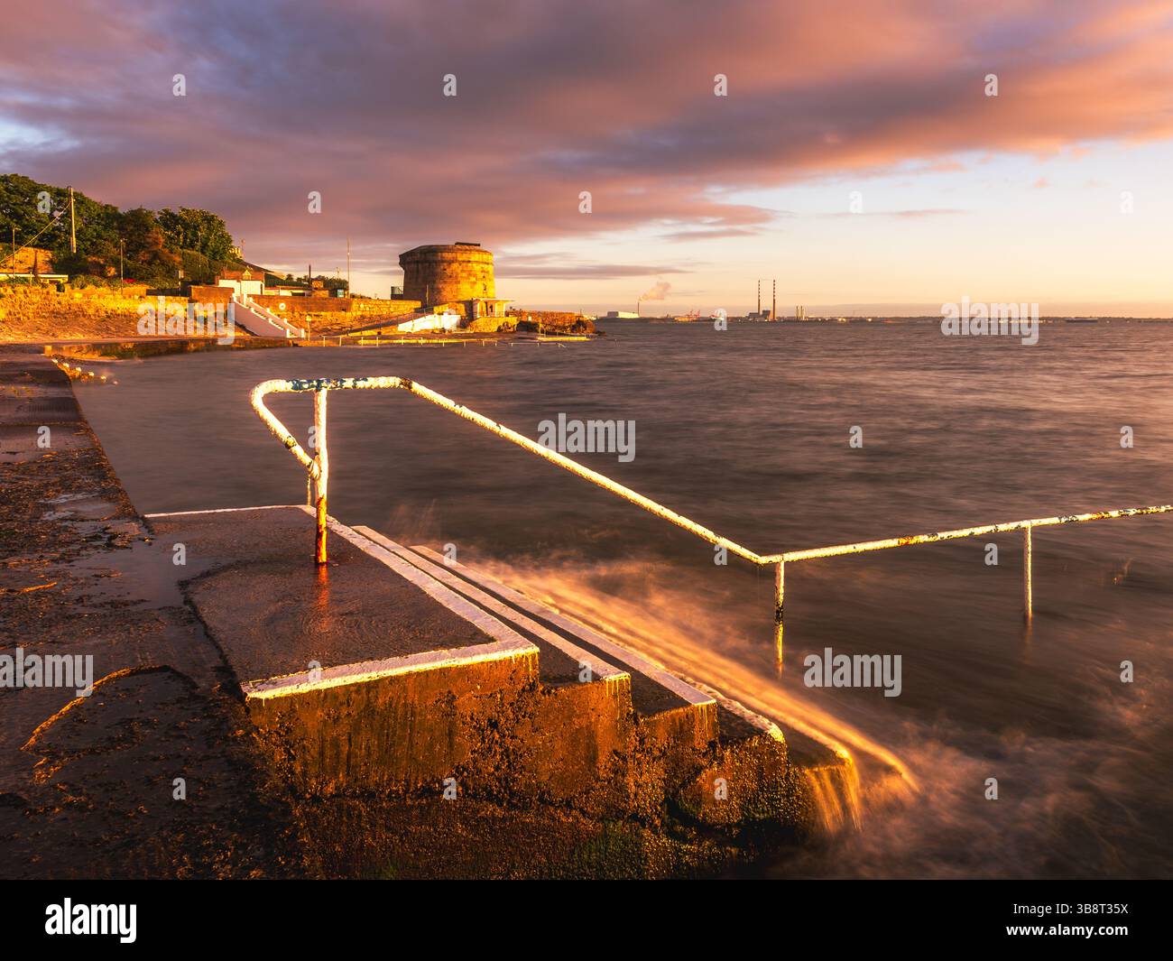 Sunrise over Seapoint Beach Stock Photo - Alamy
