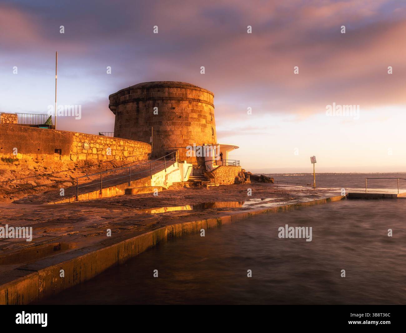 Sunrise over Seapoint Beach Stock Photo - Alamy