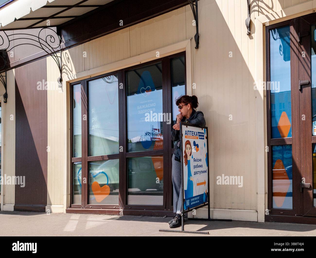 Kyiv, Ukraine - 1st May, 2025 shows locals engaging with vendors at a ...
