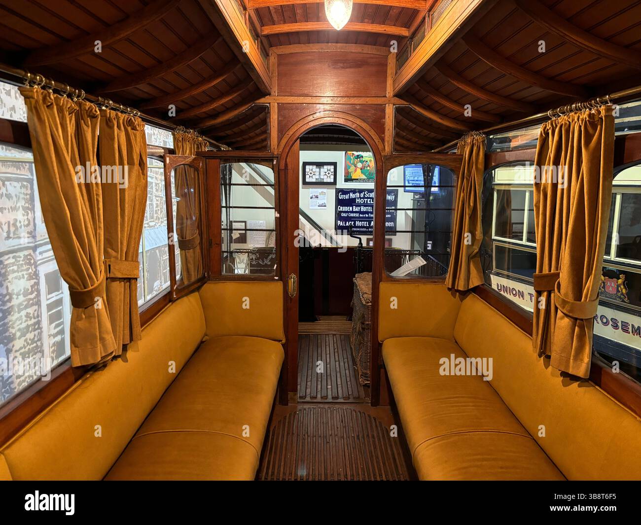 Interior view of a vintage tram. Wood trim, seats and fittings Vintage ...