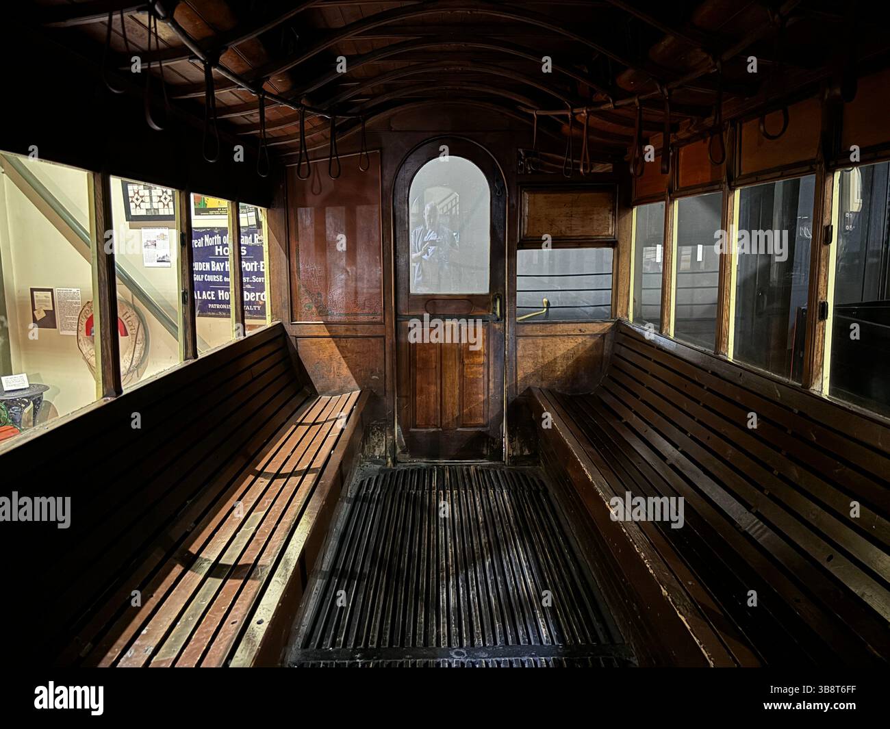Interior view of a vintage tram. Wood trim, seats and fittings Vintage ...