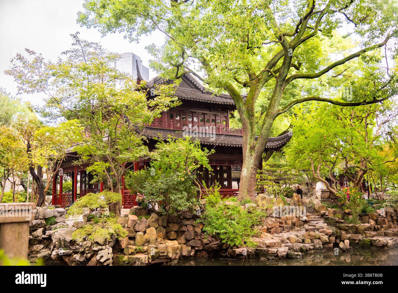 Traditional chinese architecture among trees of Yu garden in Shanghai ...