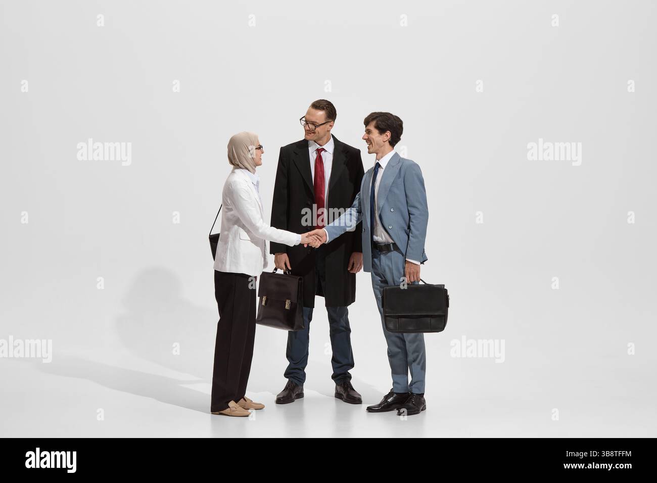 Confident business team, dressed formal attire, poses against white ...