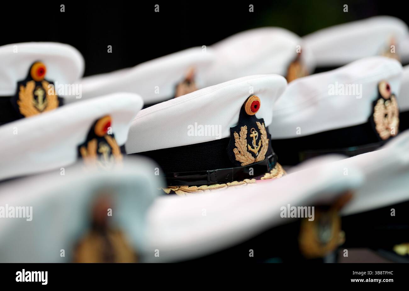 Hamburg, Germany. 08th May, 2025. Service caps of members of the navy ...