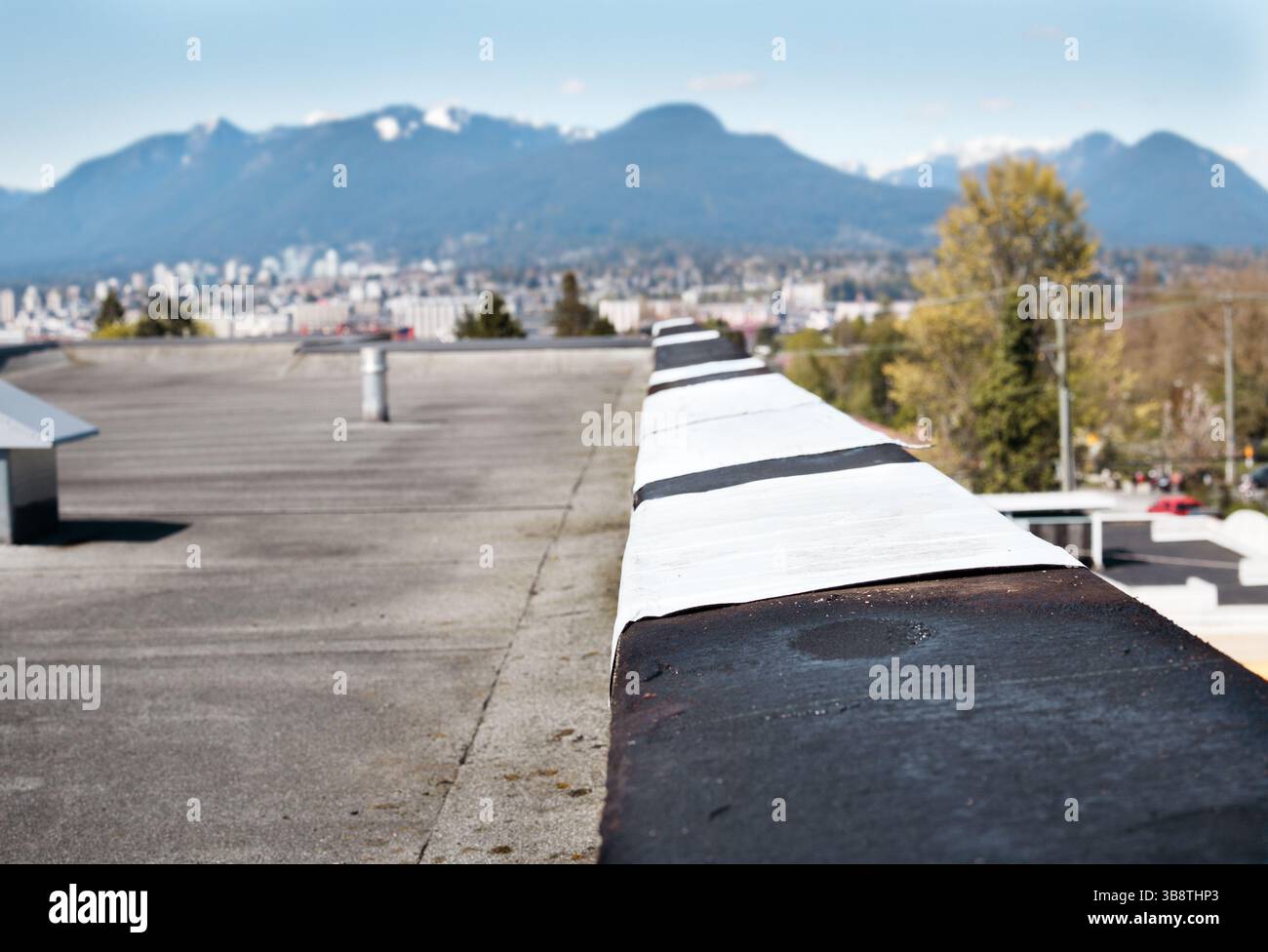 Self-adhered waterproof membrane on flat roof. Temporary or permanent ...