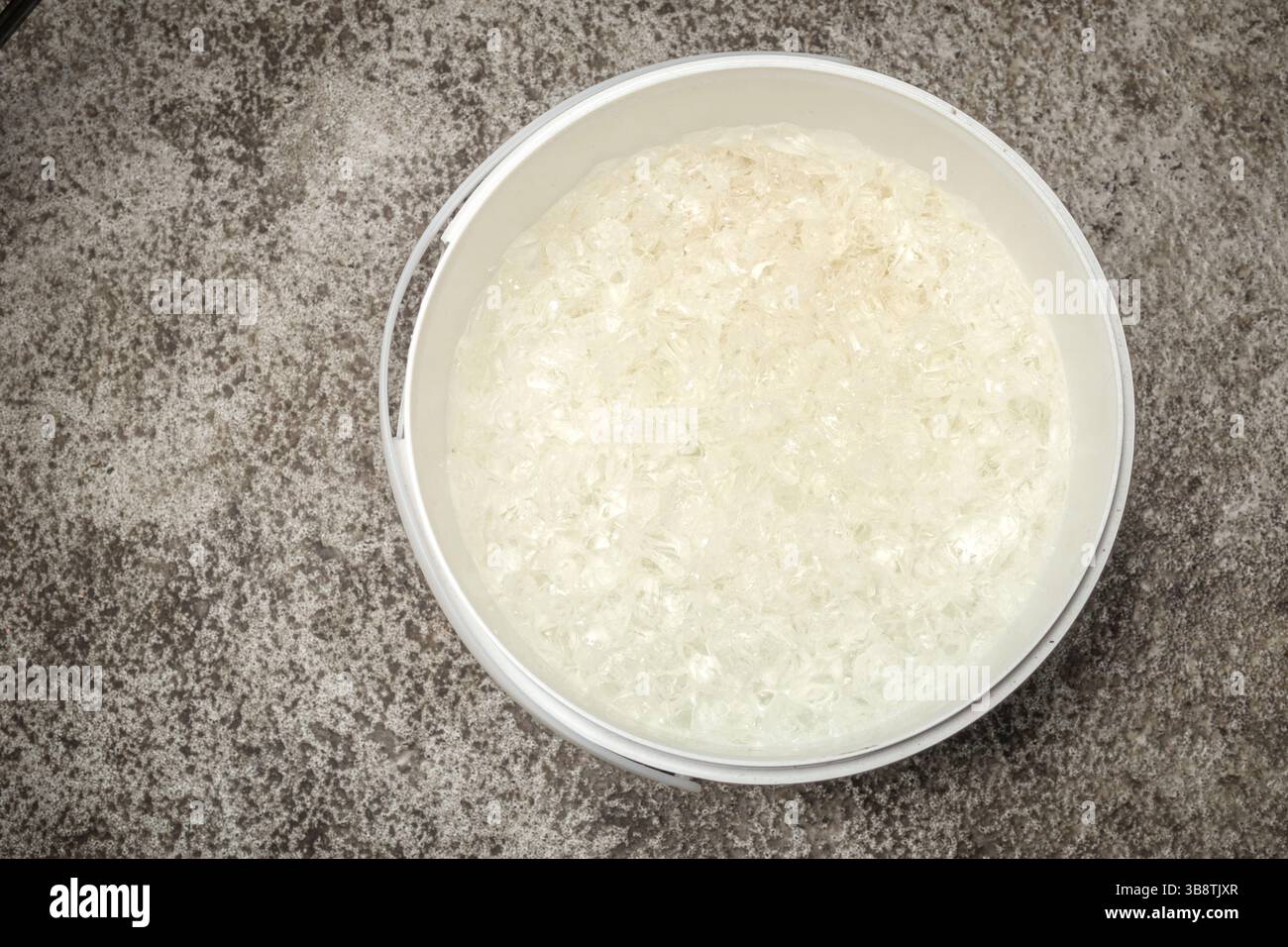 Odor neutralizer gel in large tub or bucket. Top view. Fragrance ...