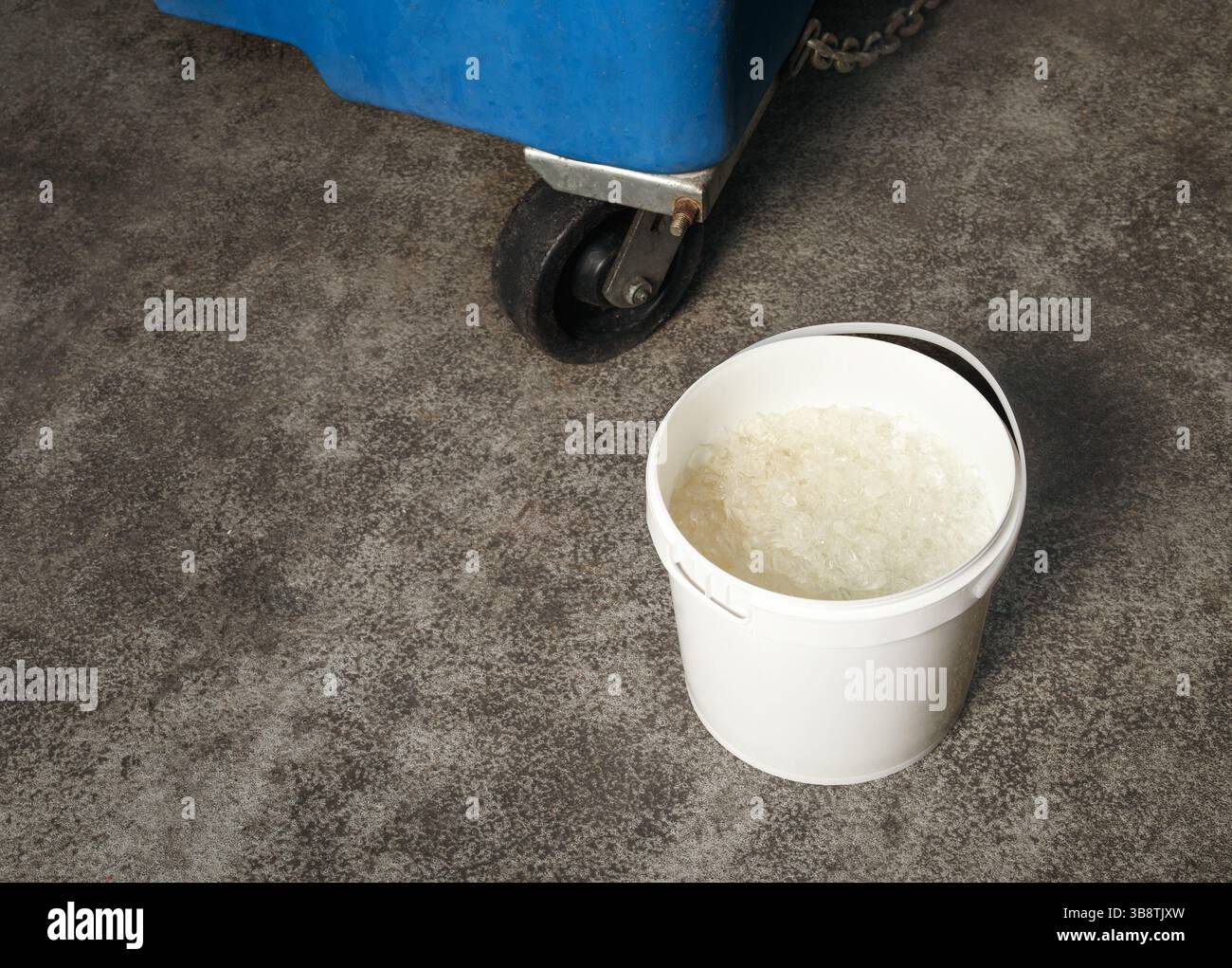 Odor neutralizer gel bucket next to garbage container. Fragrance ...