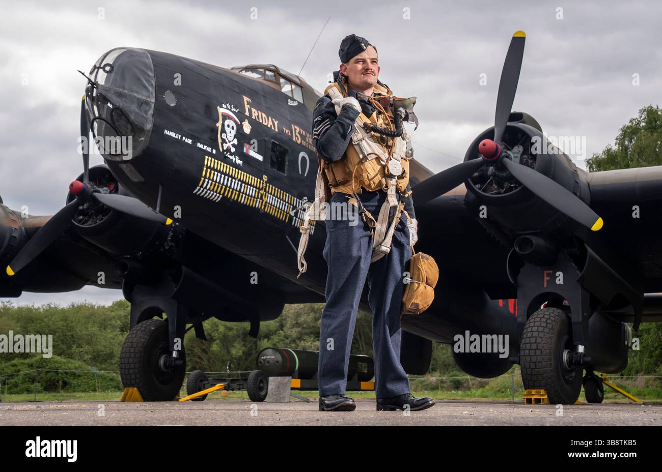WW2 re-enactor Gerallt Wheeler with a Halifax bomber at Elvington Air ...