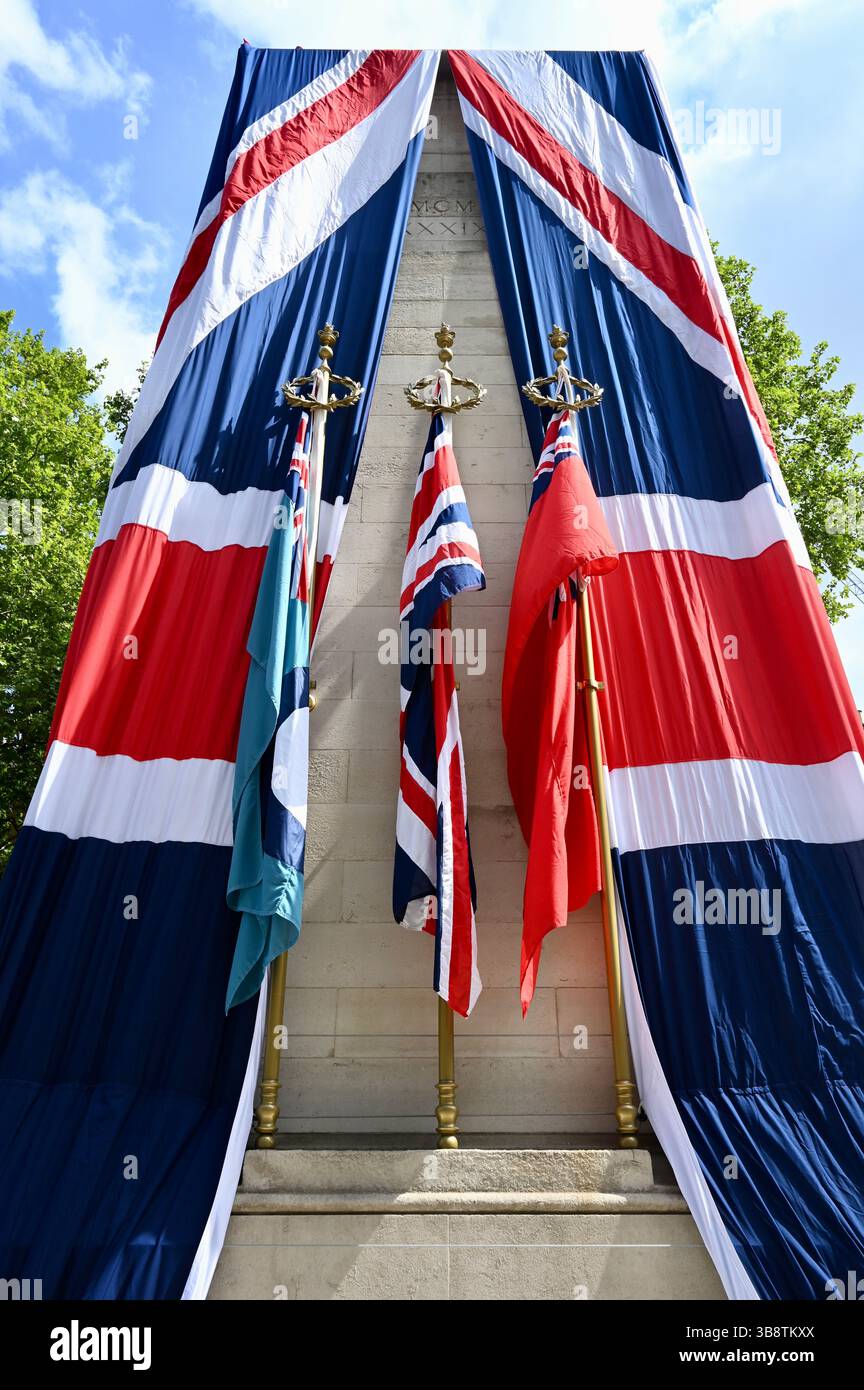 London, UK. The Cenotaph in Whitehall draped in a giant Union flag for ...