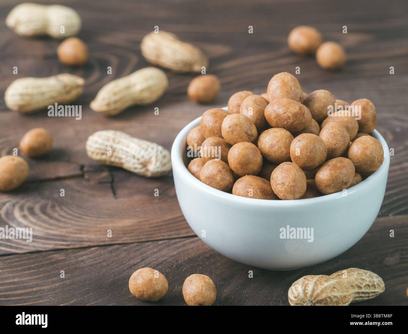 Peanut snack for beer, wine, party bar. Salted peanuts in coconut glaze ...