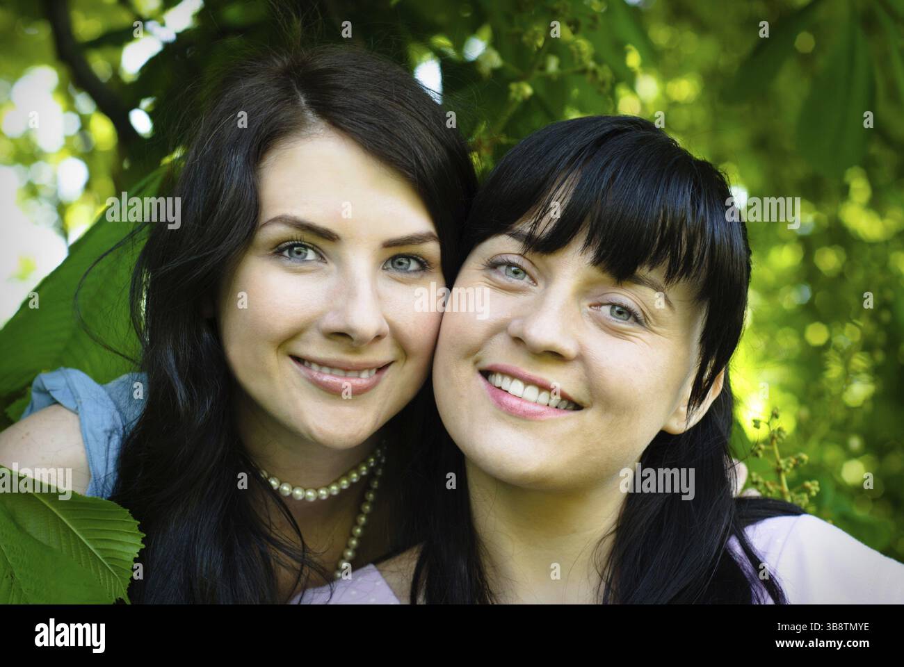 Two sisters hug one hi-res stock photography and images - Alamy