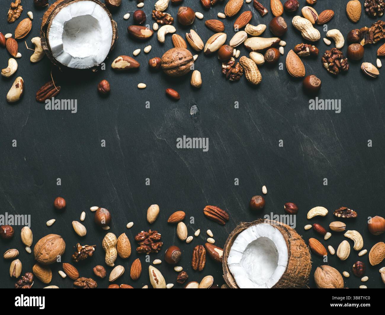 Background of mixed nuts - coconut, hazelnuts, walnuts, almonds, pecan ...